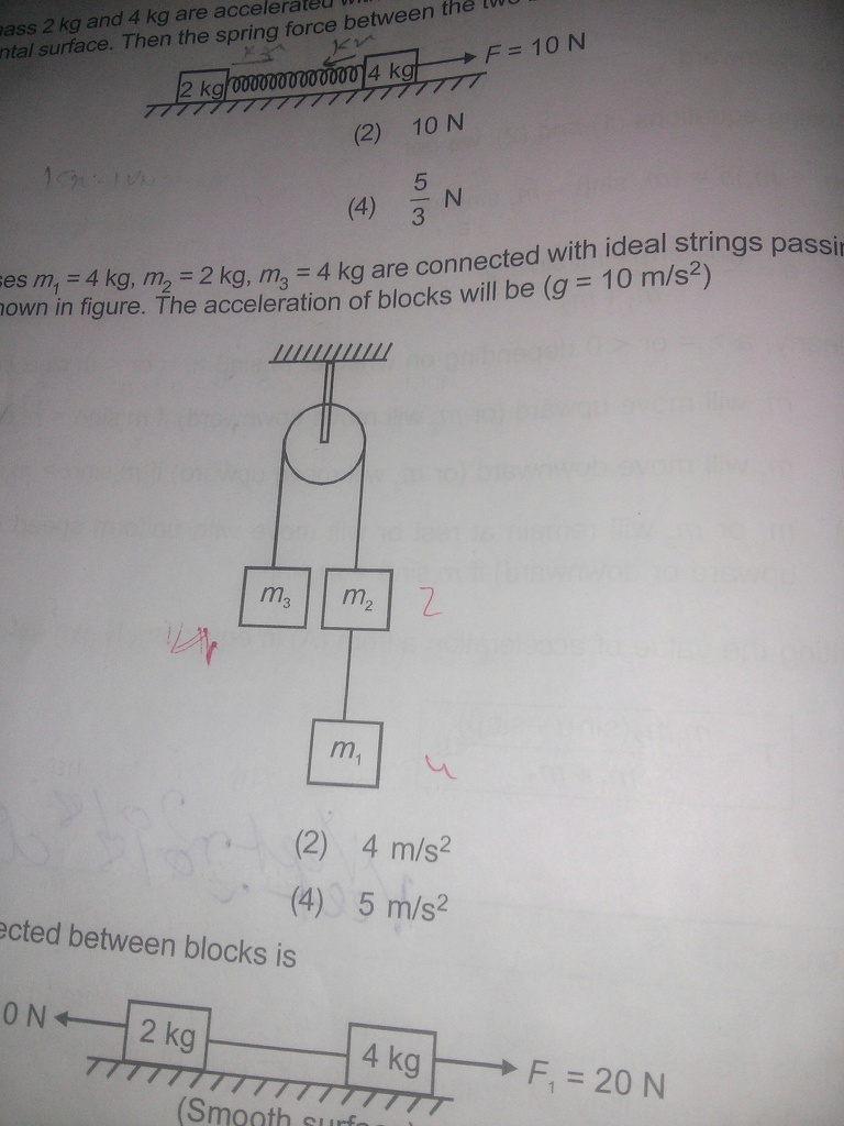 Three blocks of masses m1=4kg m2=2kg m3=4kg are connected with ideal - askIITians